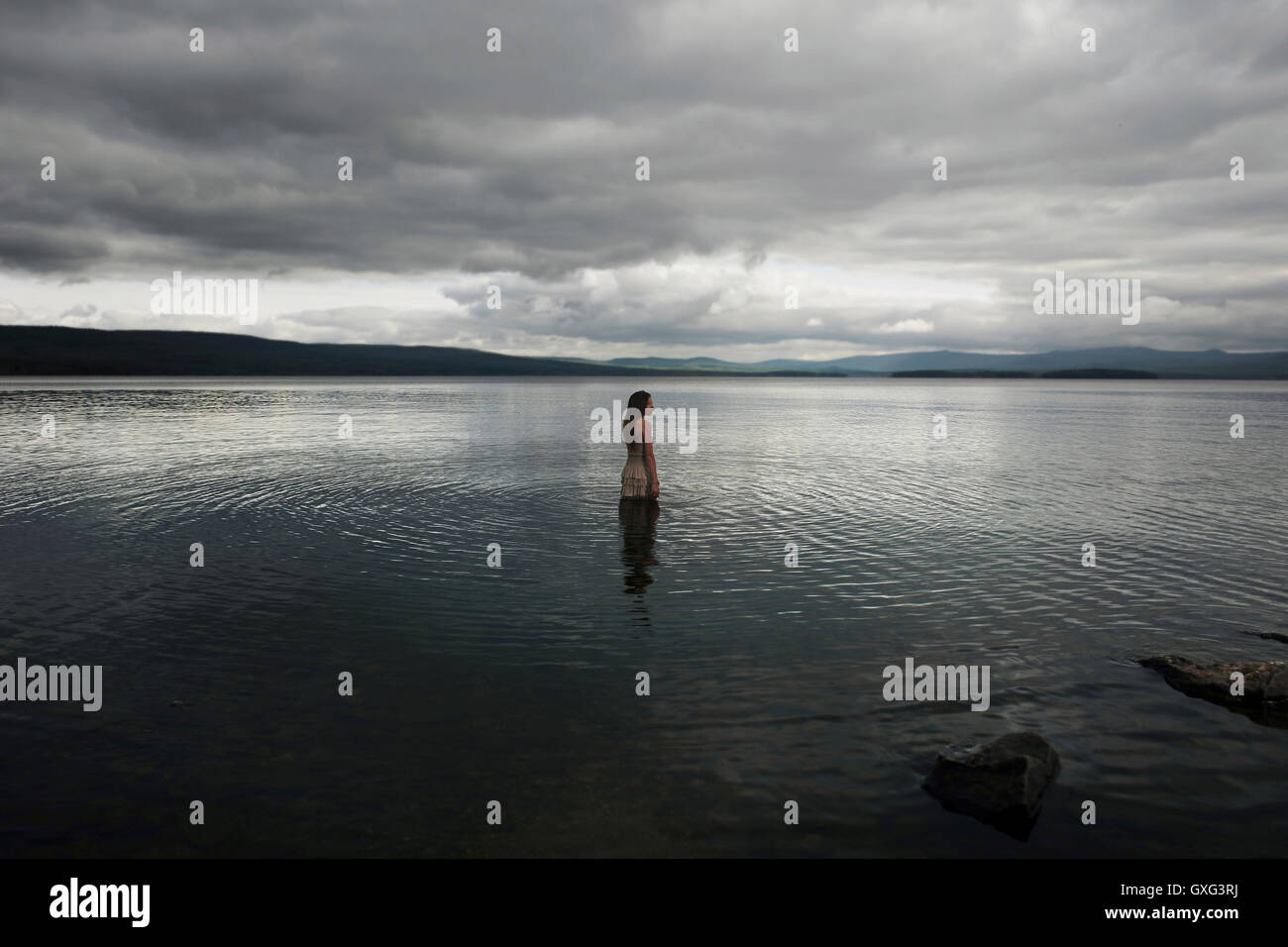 Child wading in water hi-res stock photography and images - Alamy