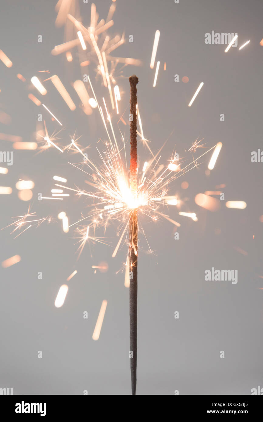 Sparks on burning sparkler Stock Photo - Alamy