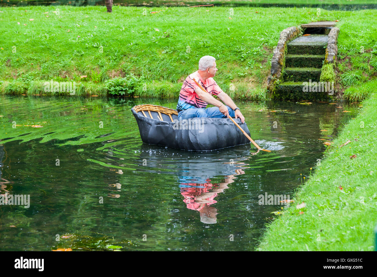 Man paddling a Welsh Coracle at St Fagans Museum, Cardiff, Wales Stock ...