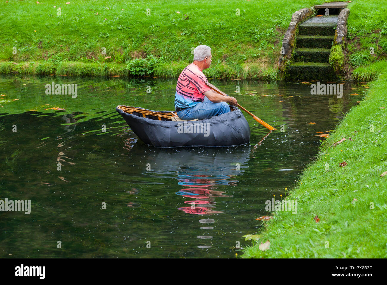 Man paddling a Welsh Coracle at St Fagans Museum, Cardiff, Wales Stock ...