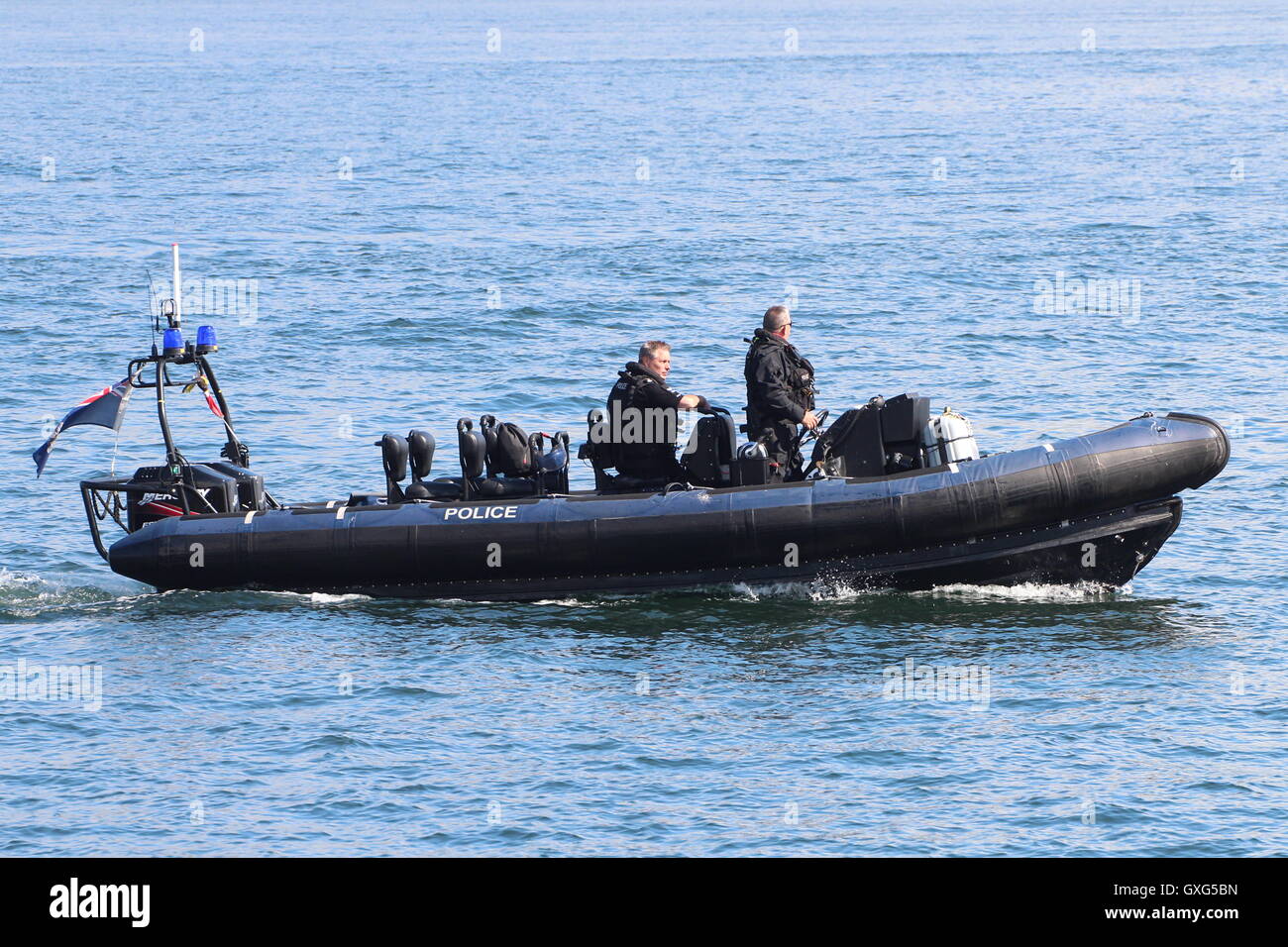 A MoD Police RHIB patrolling the waters off Greenock, during the ...