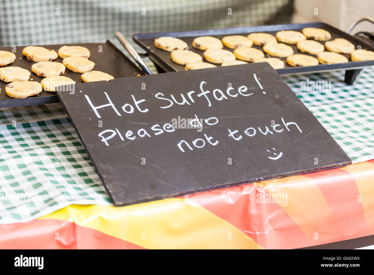 Hot surface - do not touch sign! Stock Photo - Alamy