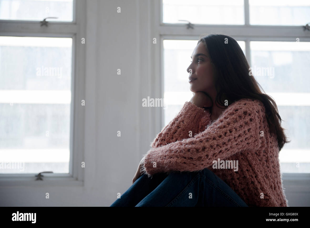 Latina woman wearing jeans hi-res stock photography and images - Alamy