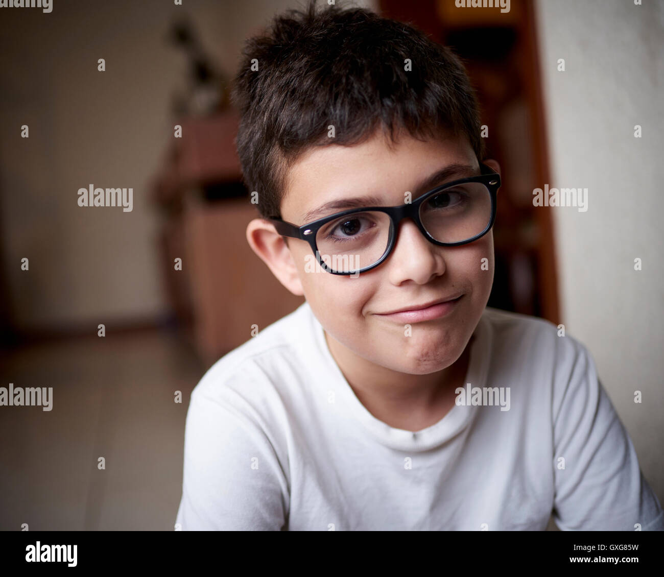 Child Smirking High Resolution Stock Photography and Images - Alamy