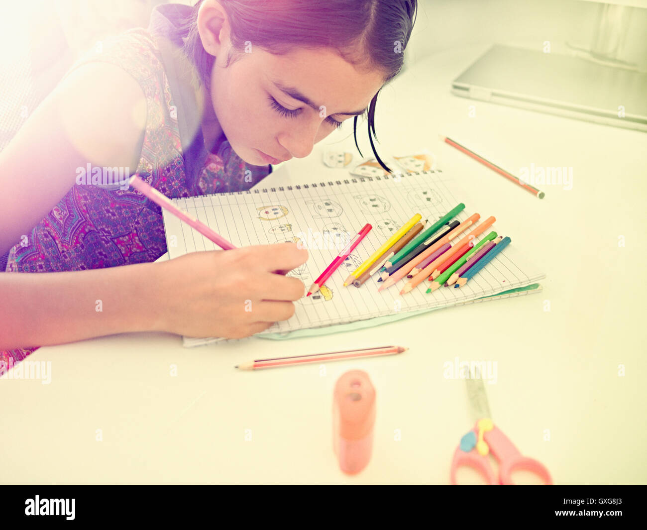 Mixed race girl painting face hi-res stock photography and images - Alamy