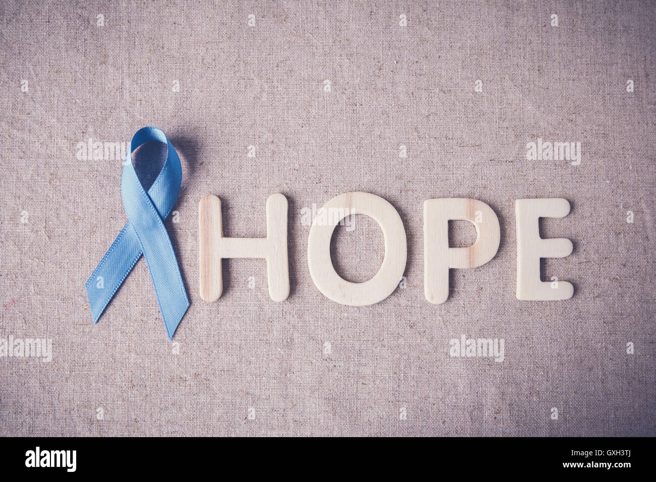Blue ribbon symbolic prostate hi-res stock photography and images - Alamy