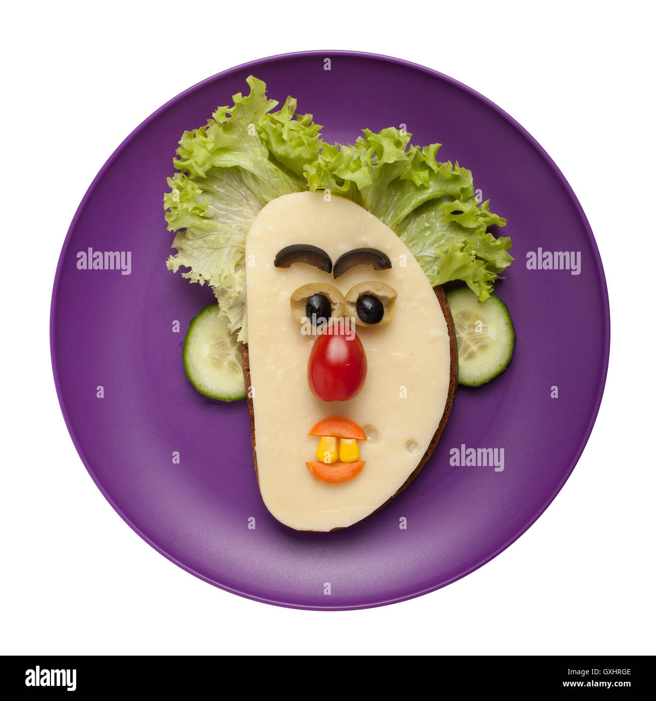 Funny face made of bread and cheese on plate Stock Photo - Alamy