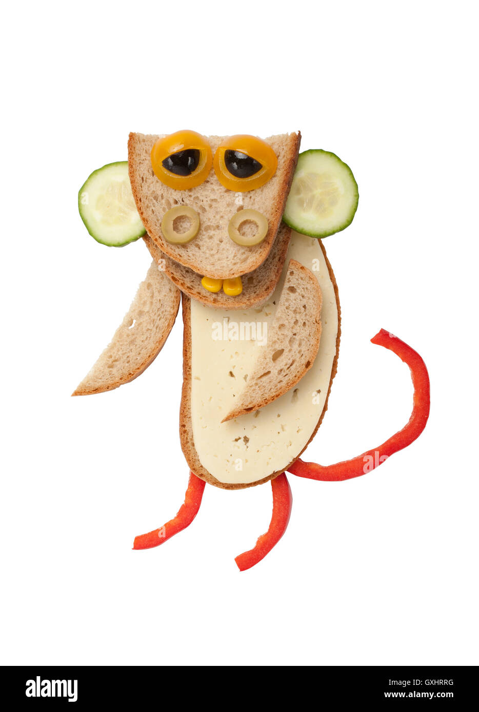 Funny monkey made of bread, cheese and vegetables on white background ...