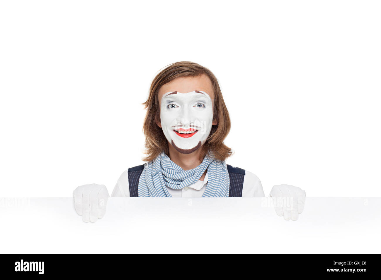 mime smiling with white billboard Stock Photo - Alamy