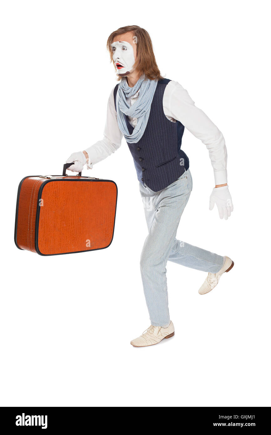 Man running suitcase in hand hi-res stock photography and images - Alamy
