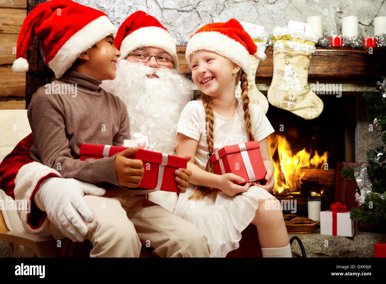 Santa and children Stock Photo - Alamy