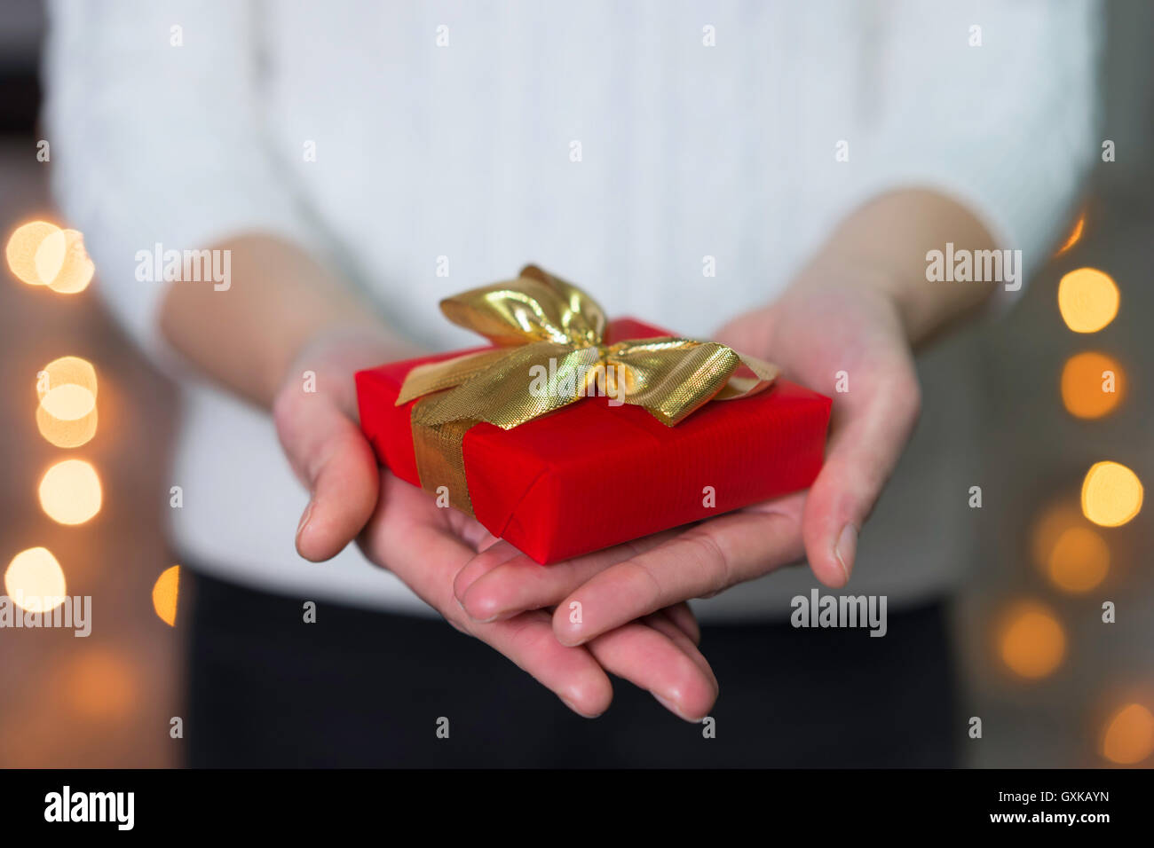 Presenting gift hi-res stock photography and images - Alamy