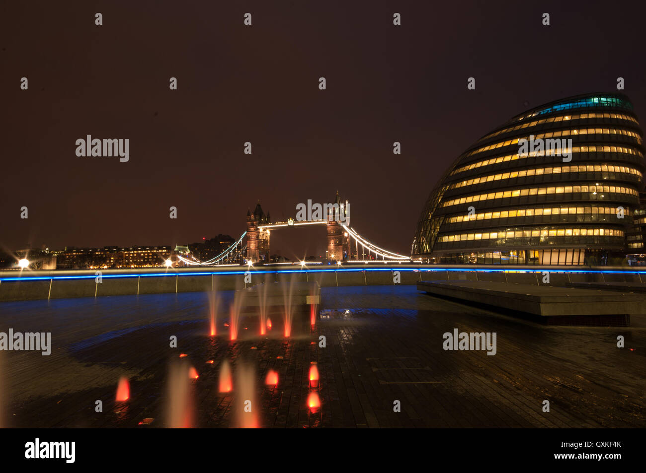 Tower Bridge lit up at night, with the Lord Mayor's Building to its ...