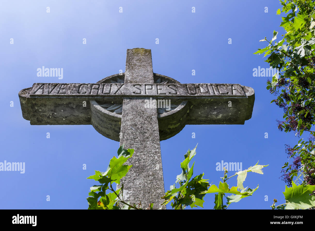 Old stone Christian cross on a bright sunny day Stock Photo - Alamy