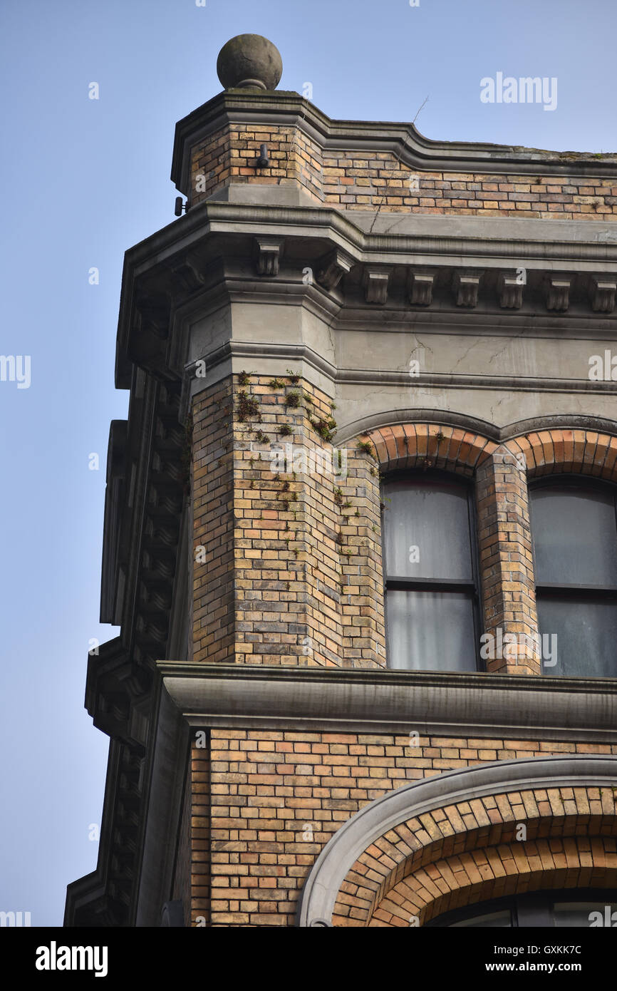 Old style brick city building Stock Photo - Alamy