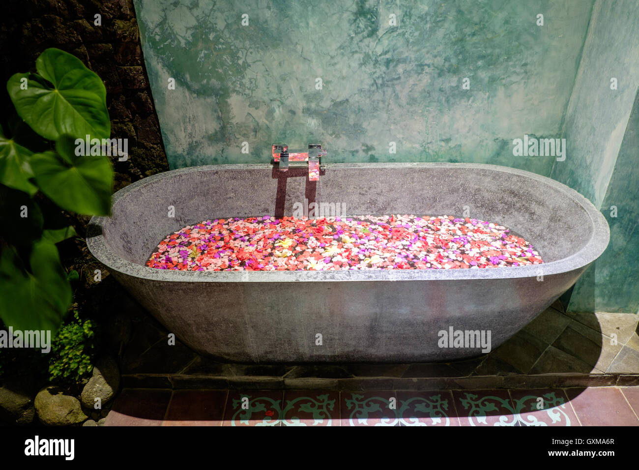 Bath filled with flowers in Bali, Indonesia Stock Photo - Alamy