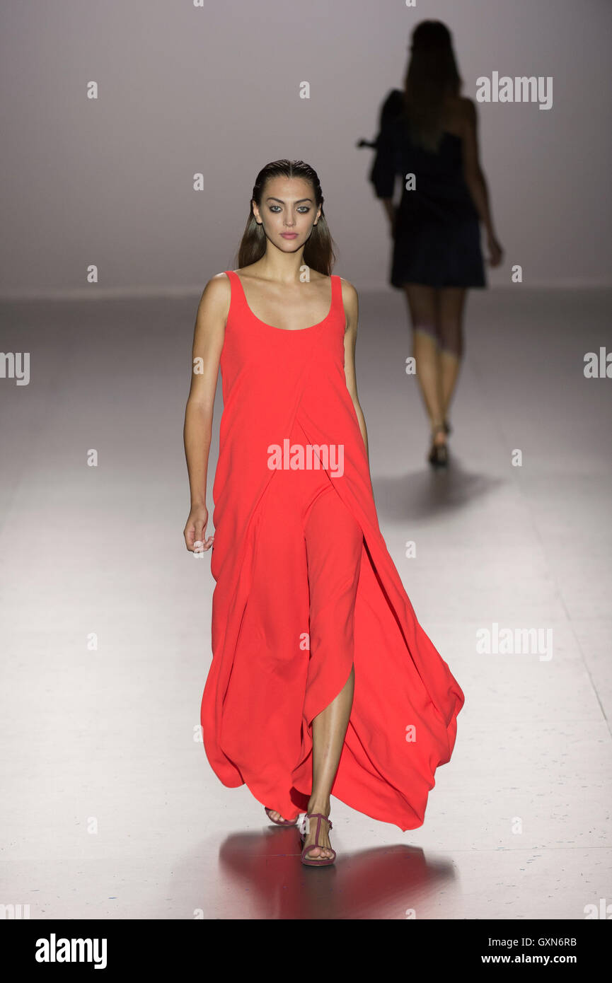 A model wears at collection runway a creation from Roberto Torretta ...