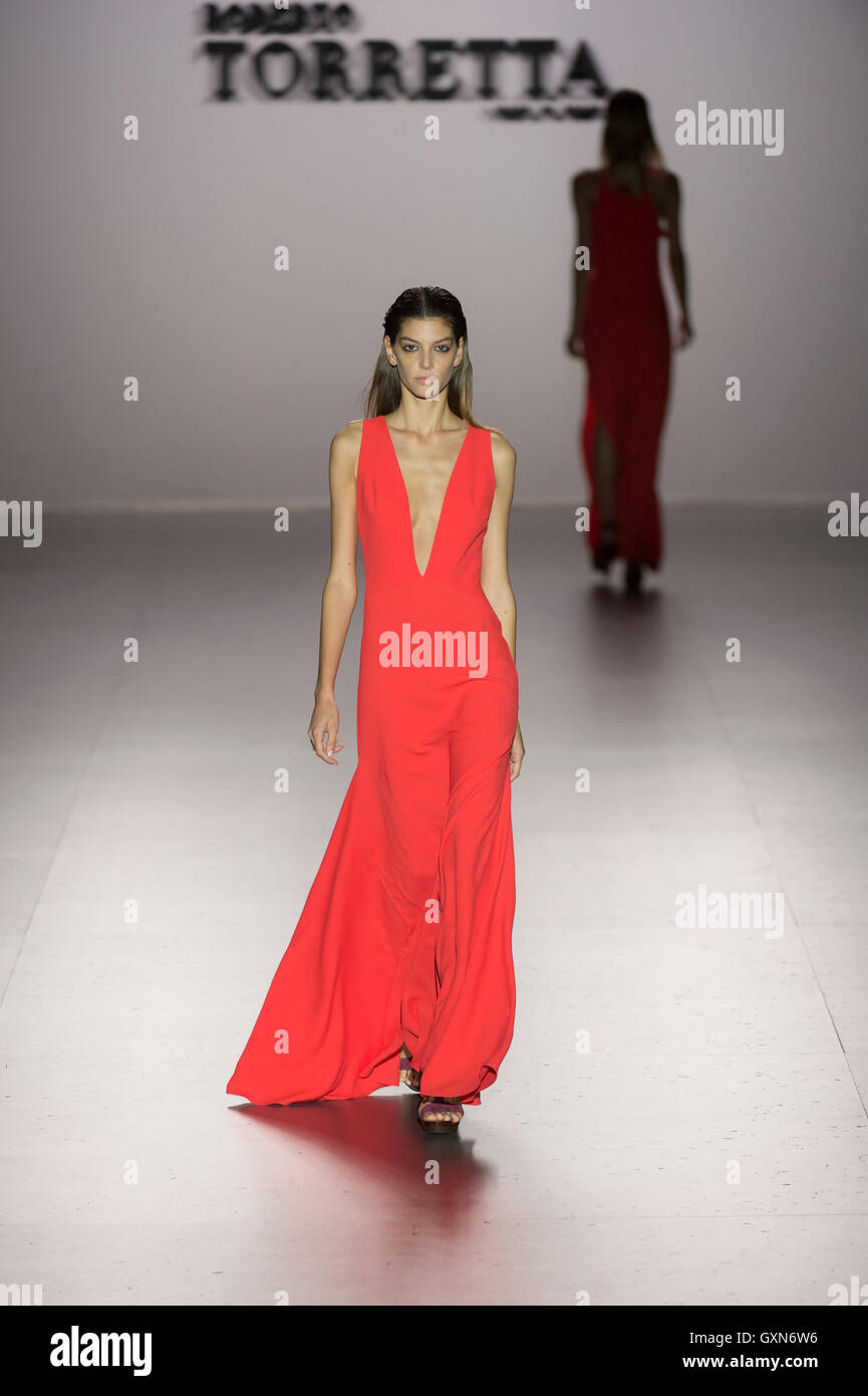 A model wears at collection runway a creation from Roberto Torretta ...