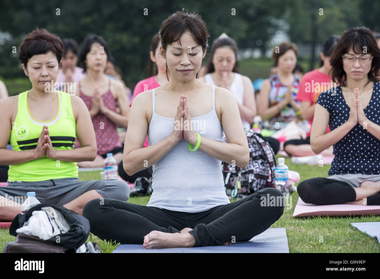 Yokohama, Kanagawa, Japan. 17th Sep, 2016. Yoga festival at Rinkai Park ...