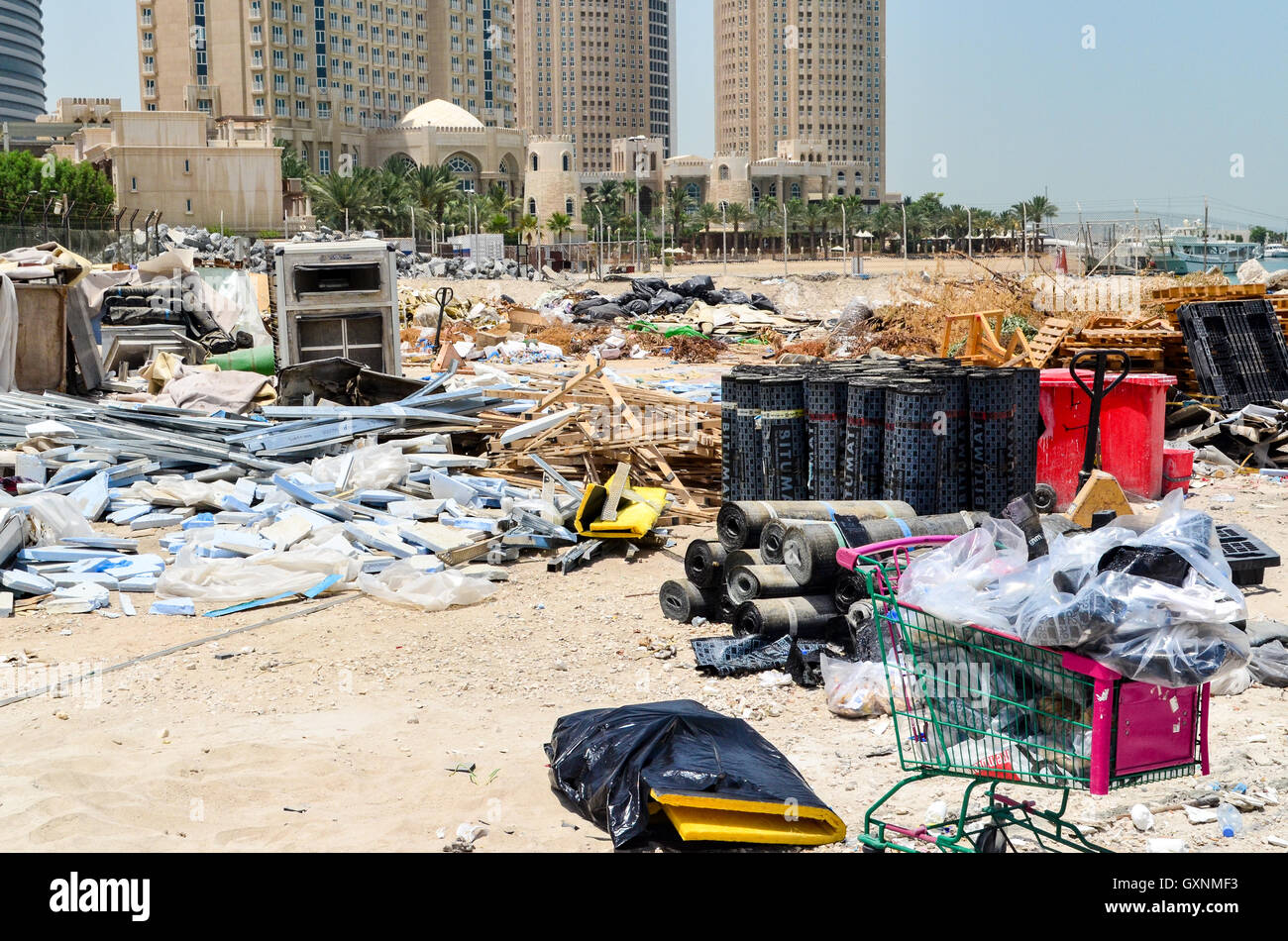 Trash on the beach in the West Bay financial district, Doha, Qatar ...