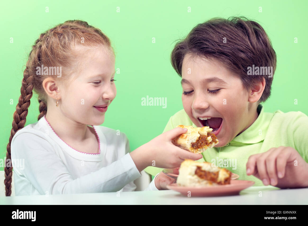 Tasting the pie Stock Photo - Alamy