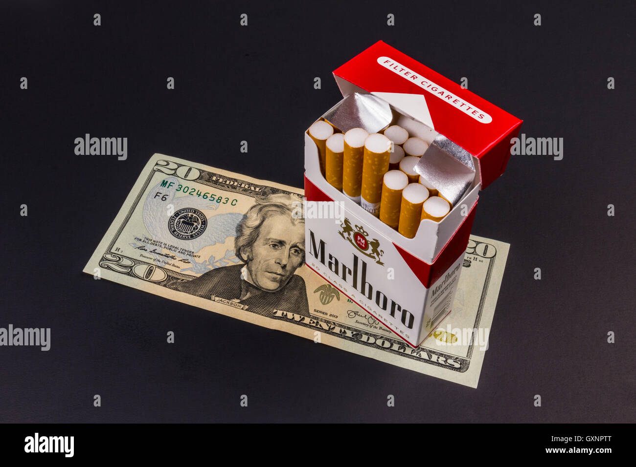 Indianapolis - Circa August 2016: Marlboro Cigarettes and Twenty Dollar ...