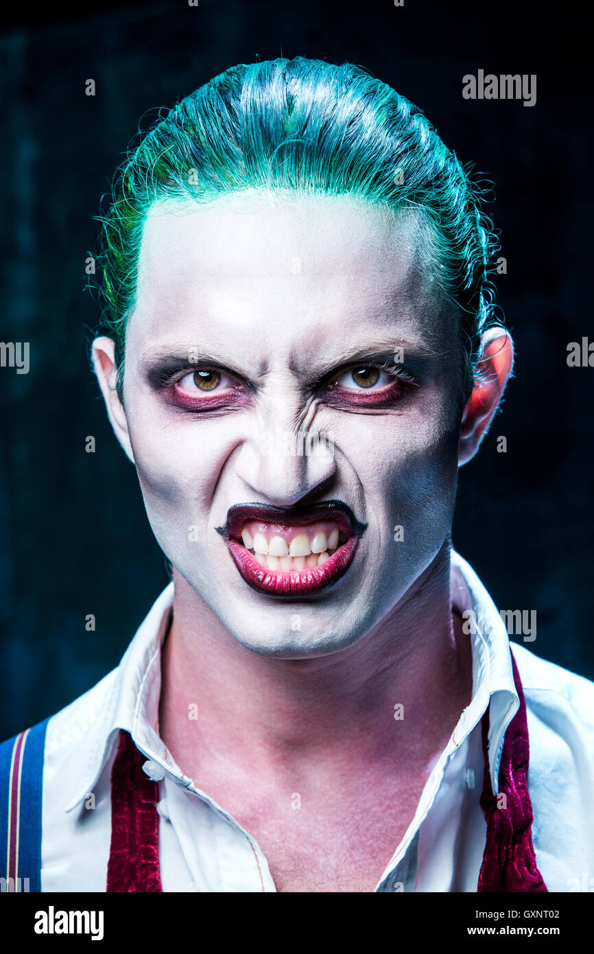 Bloody Halloween theme: crazy joker face Stock Photo - Alamy