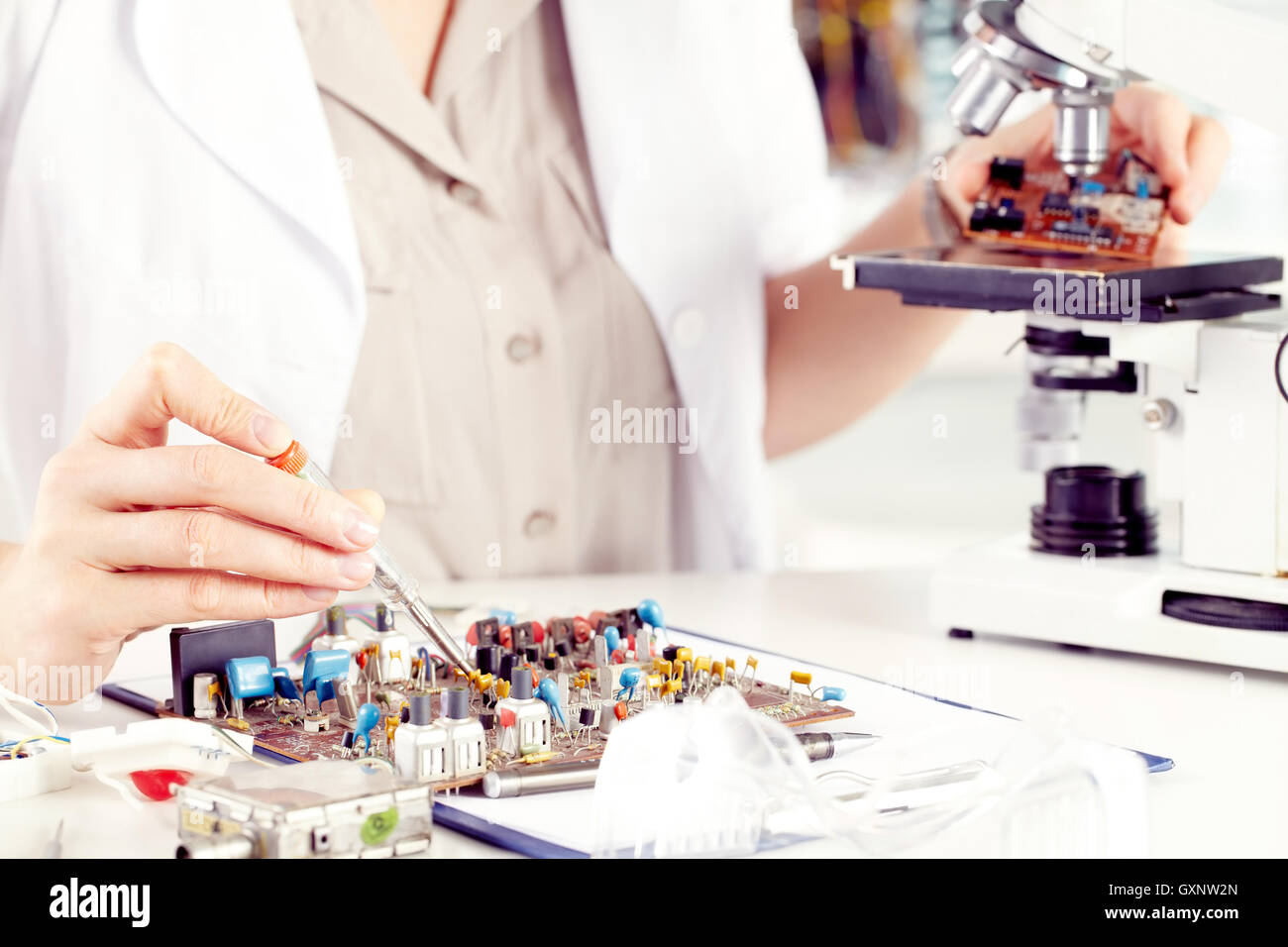 Repairing circuit board Stock Photo - Alamy