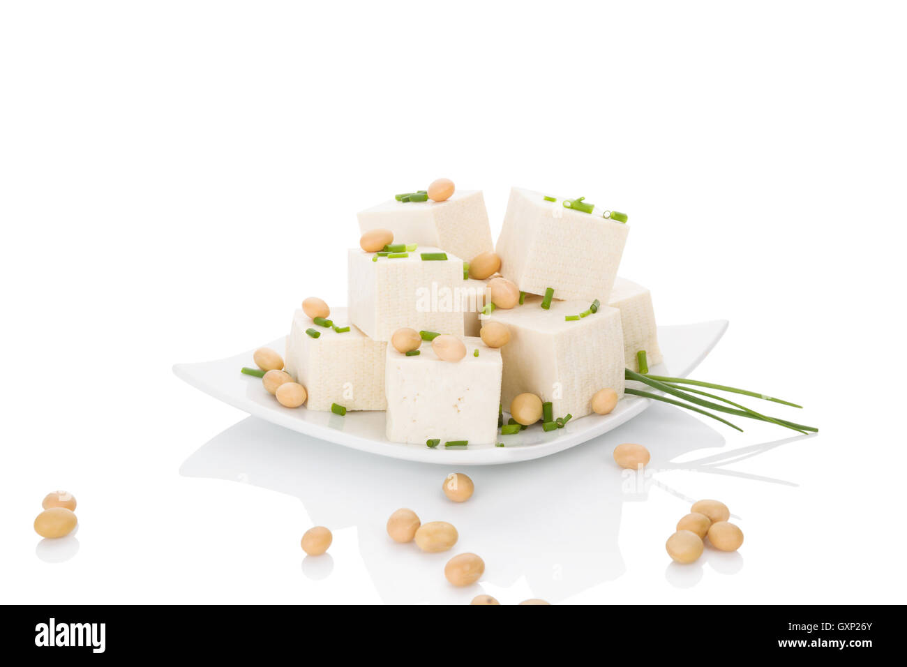 Culinary tofu eating. Tofu isolated on white background Stock Photo - Alamy
