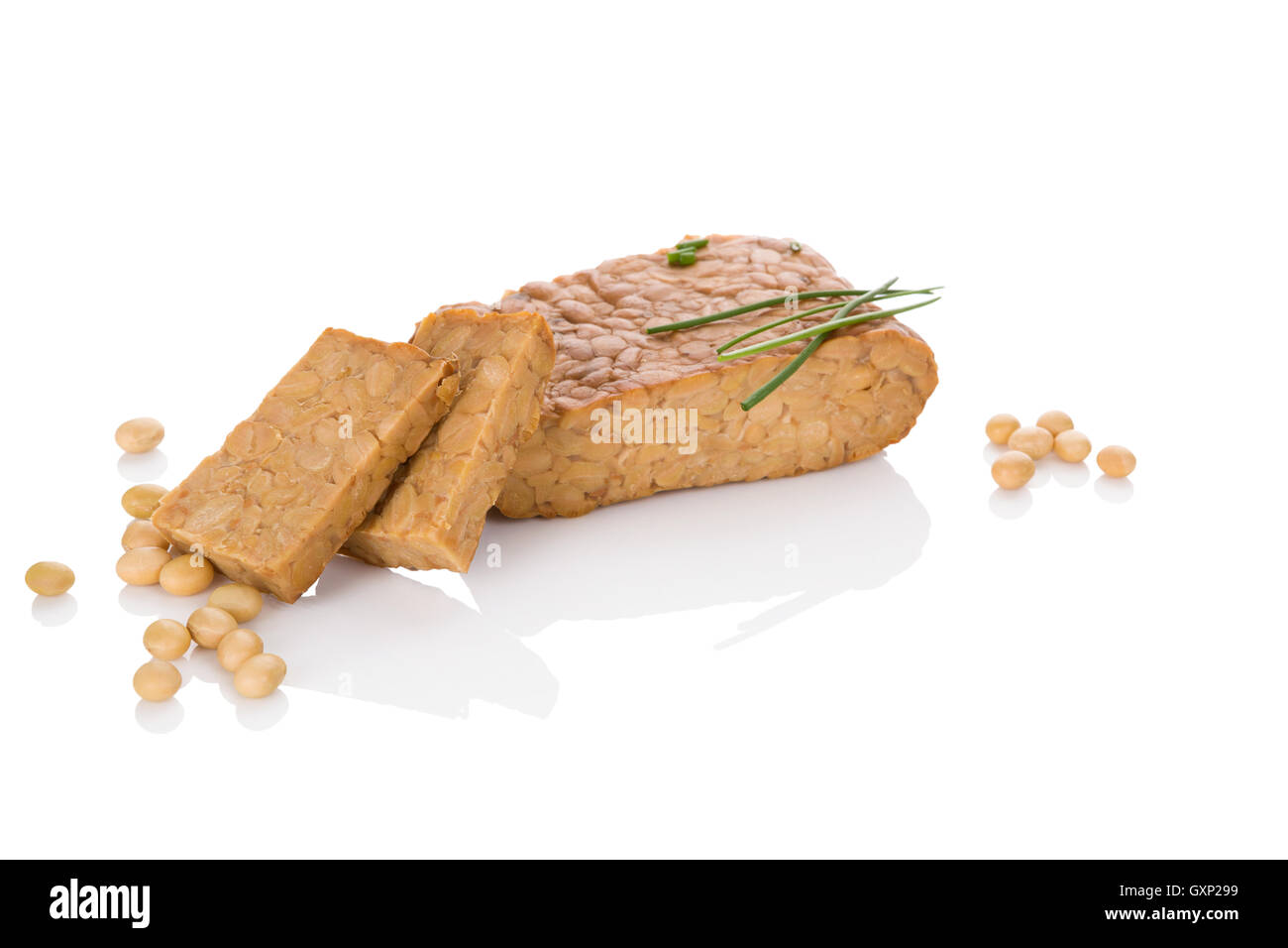 Tempeh isolated on white. Traditional soybean product Stock Photo - Alamy
