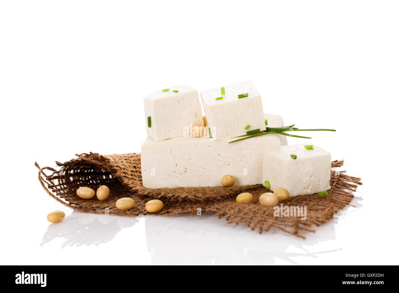 Culinary tofu eating. Tofu isolated on white background Stock Photo - Alamy