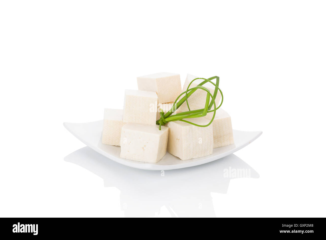 Culinary tofu eating. Tofu isolated on white background Stock Photo - Alamy