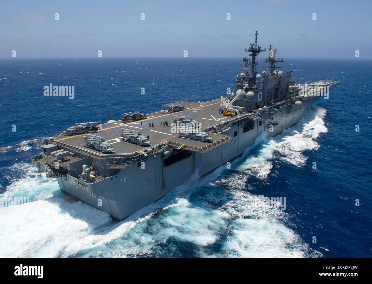 The USN America-class amphibious assault ship USS America performs ...