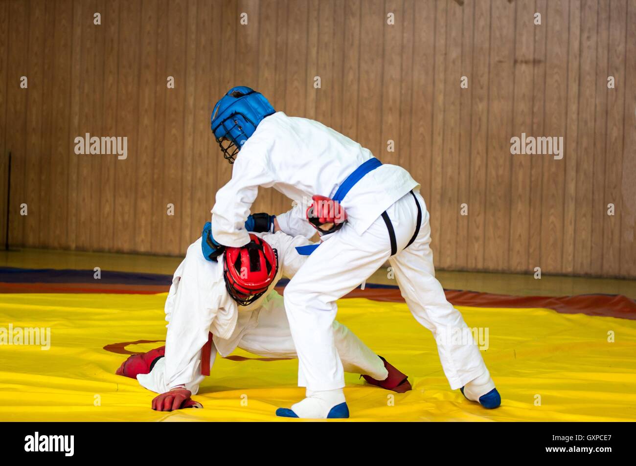 Boys fighters compete in hand-to-hand combat sports Stock Photo - Alamy