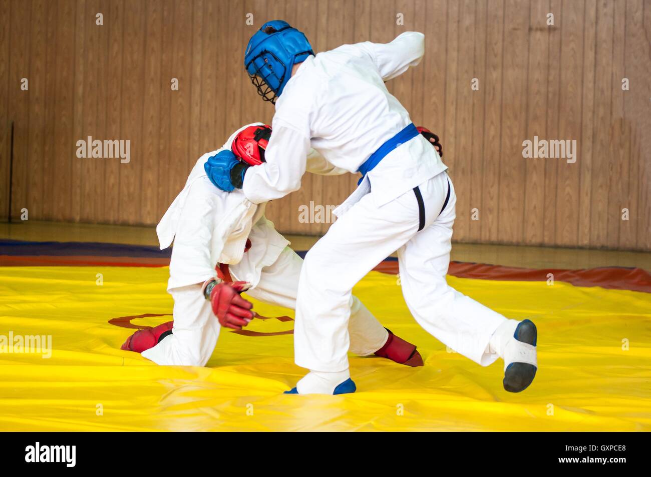 Boys fighters compete in hand-to-hand combat sports Stock Photo - Alamy