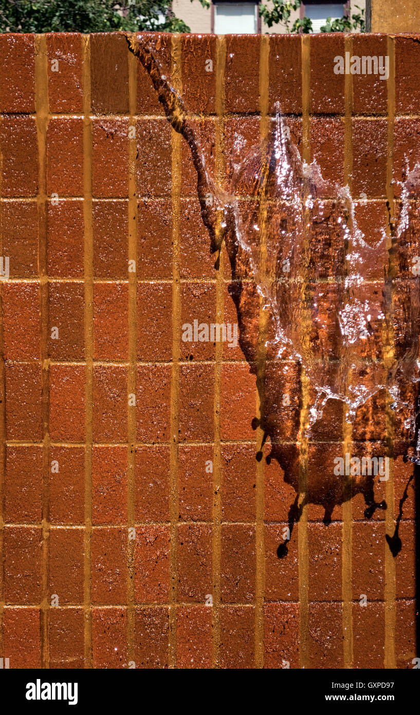 Concrete and brick water fountain in a city Stock Photo - Alamy