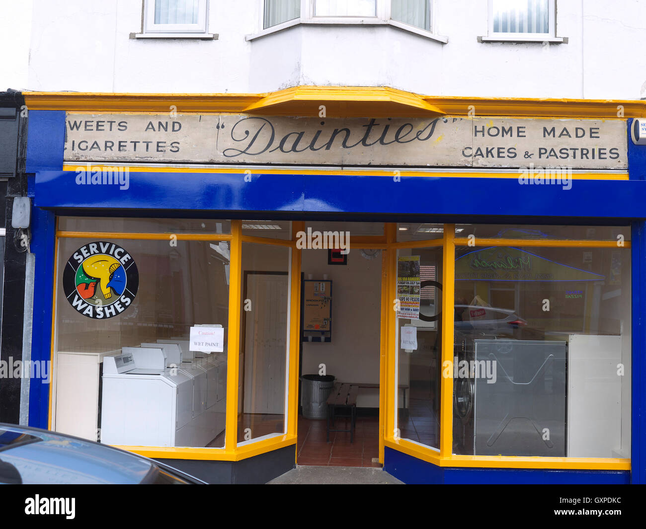 Old sign discovered under modern sign when shop was being re-painted ...