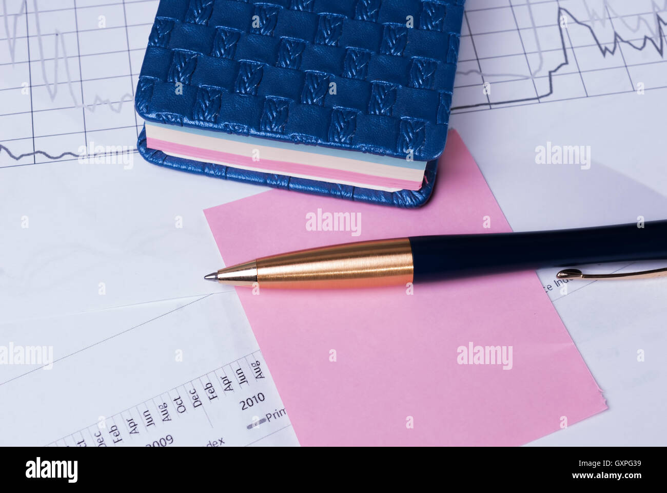 Pen lying on financial statements. Business Background Stock Photo - Alamy