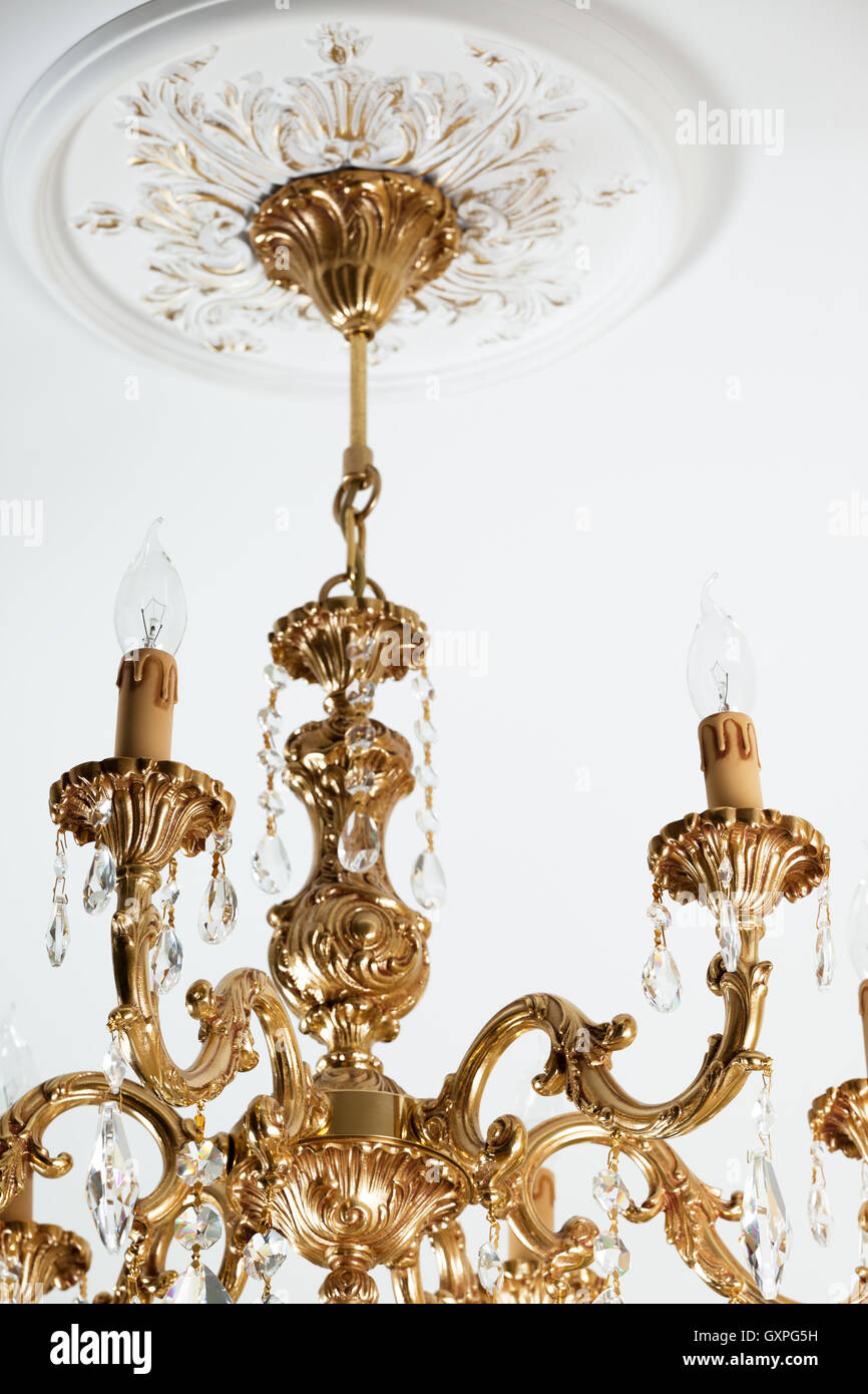 beautiful bronze chandelier in a modern apartment Stock Photo - Alamy