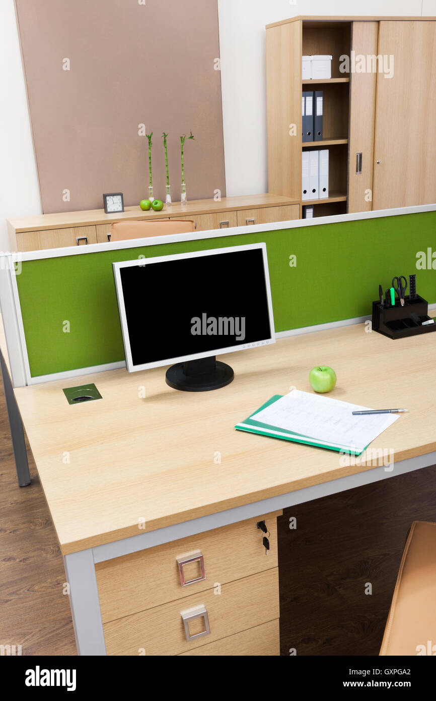 monitor on a desk in a modern office Stock Photo - Alamy