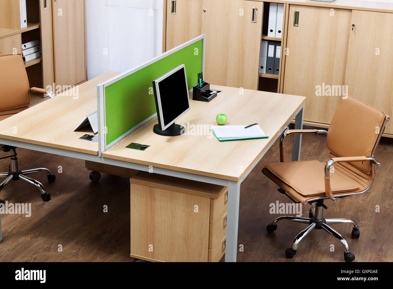 monitor on a desk in a modern office Stock Photo - Alamy