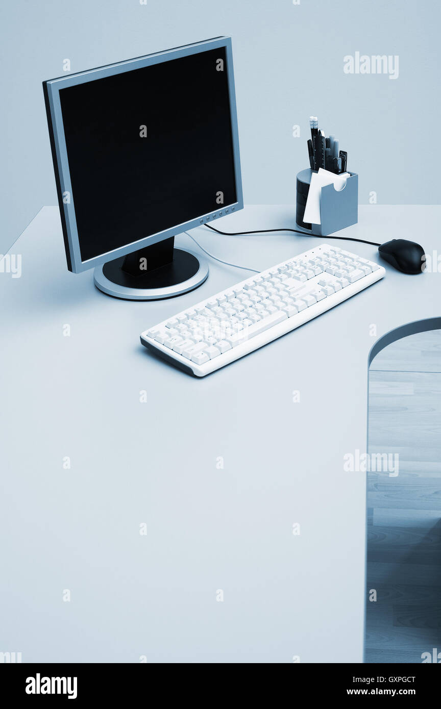 The monitor the keyboard and the mouse on a desk at office Stock Photo ...