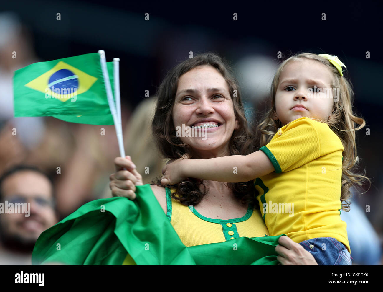 A Brazillian spectator shows her support during the eighth day of the ...