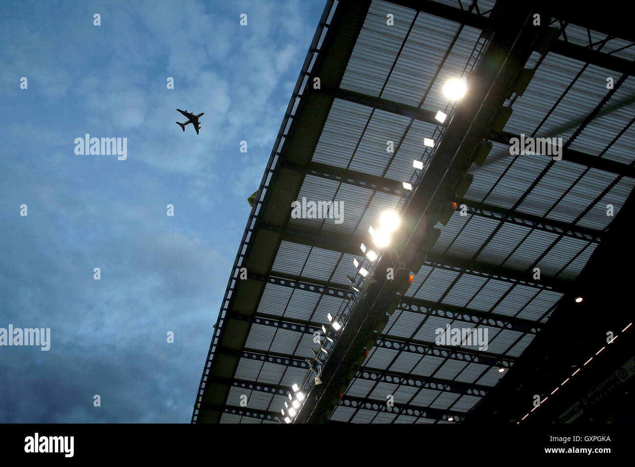 A plane passes overhead at Stamford Bridge before the Premier League ...