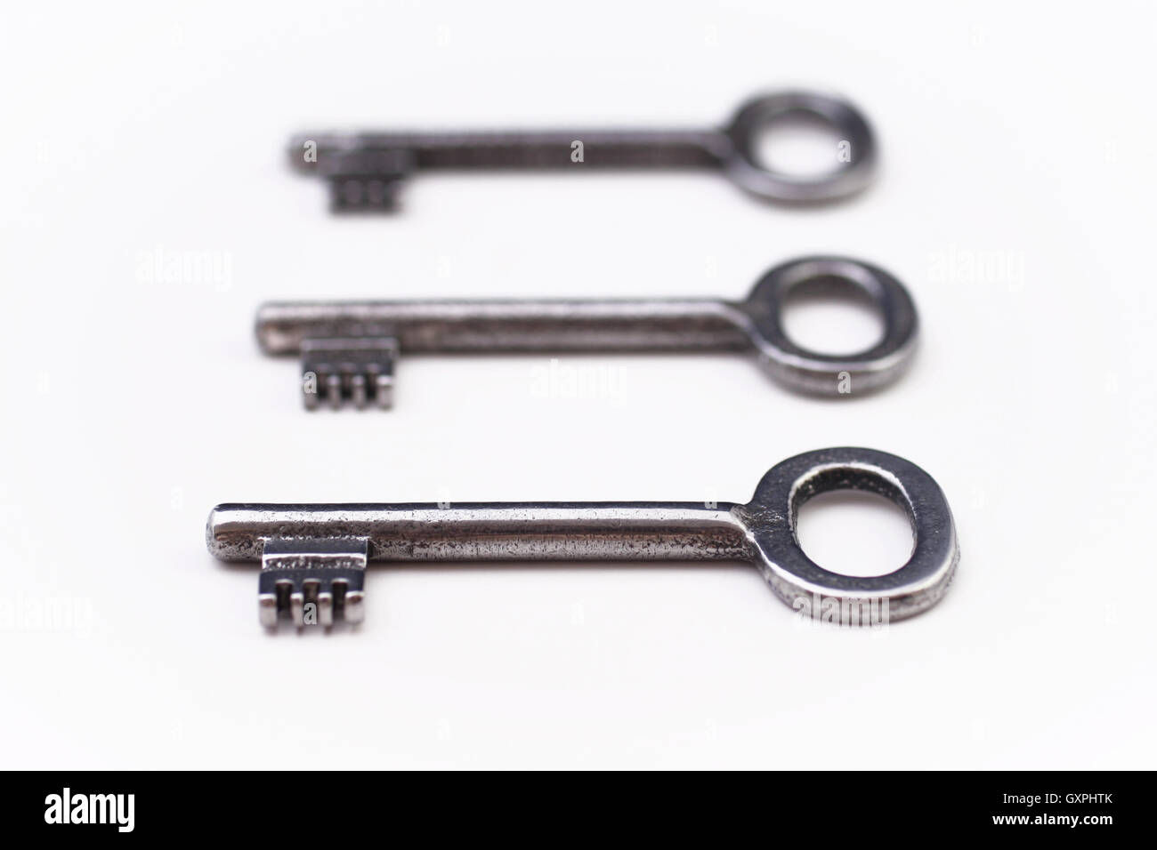 Keys on white background Stock Photo - Alamy