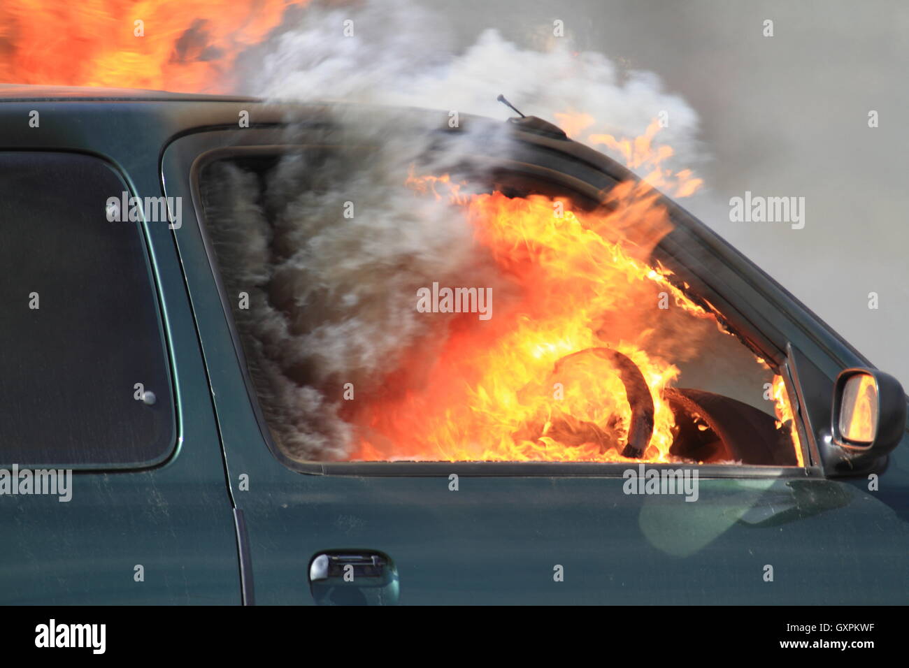 Generic car fire image Stock Photo - Alamy