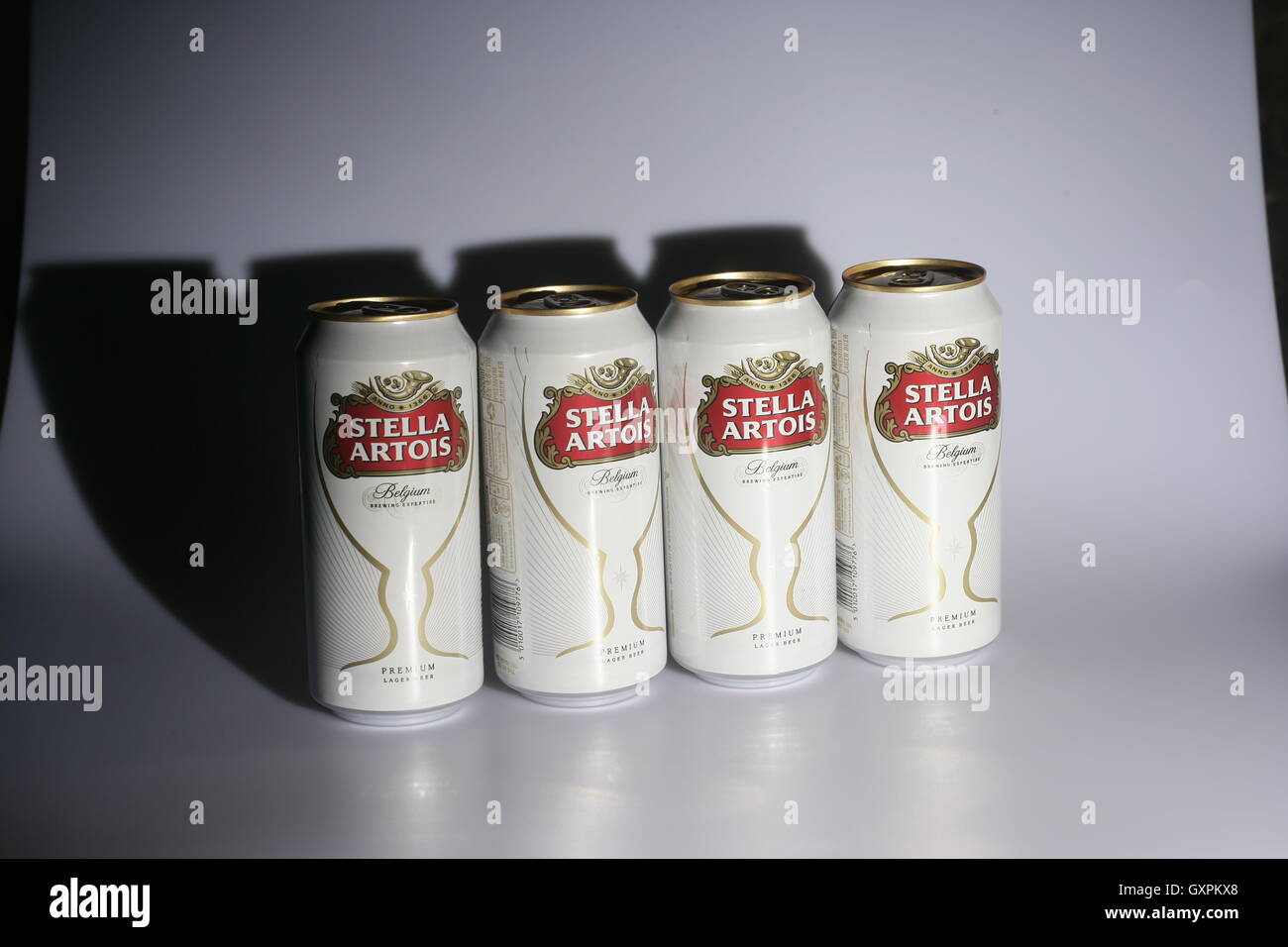 Four cans of Stella Artois lager Stock Photo - Alamy