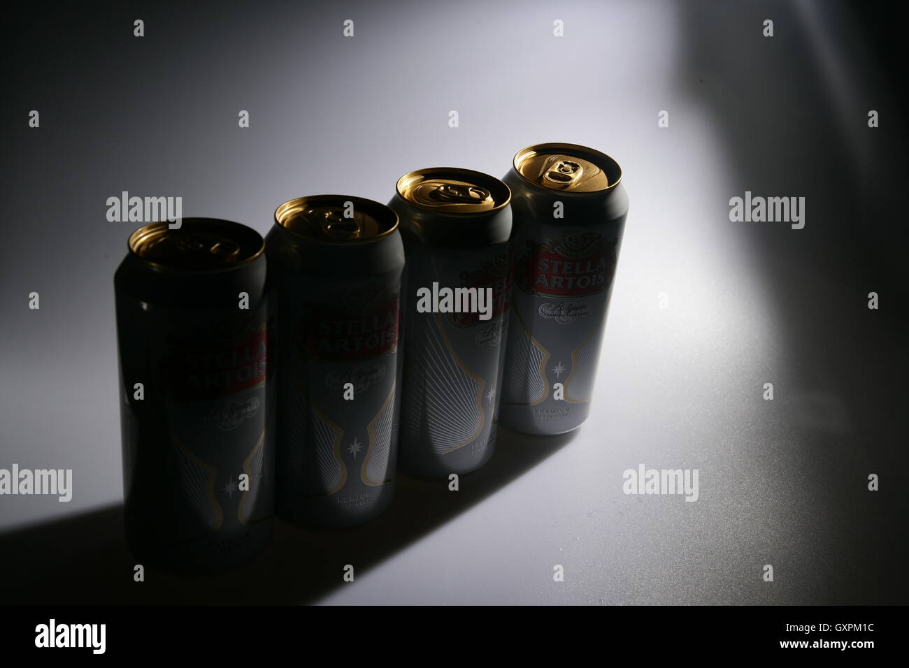 Four cans of Stella Artois lager Stock Photo - Alamy