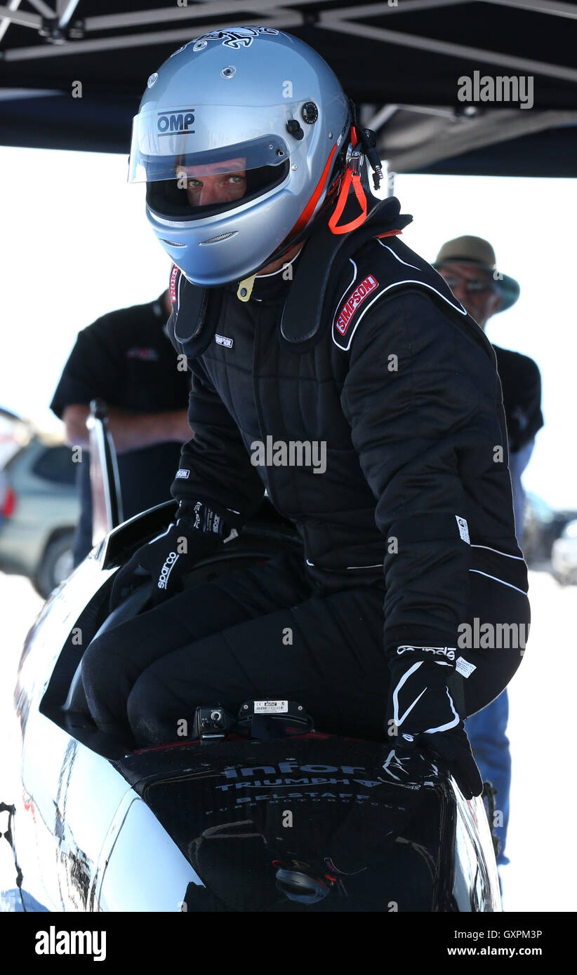The Triumph Infor Rocket Streamliner is towed out of the pits at the ...