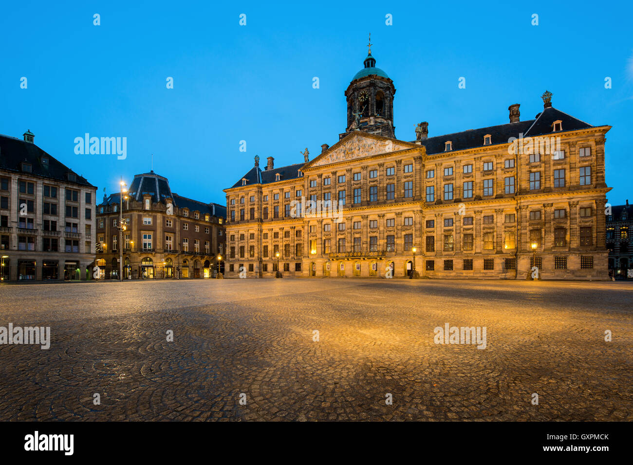 The Royal Palace in Dam square at Amsterdam, Netherlands. Dam square is ...